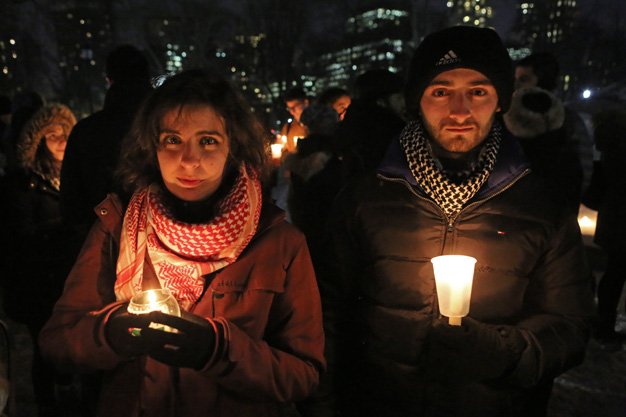 Photo gallery: Candlelight vigil for the victims of ISIS - NOW Magazine